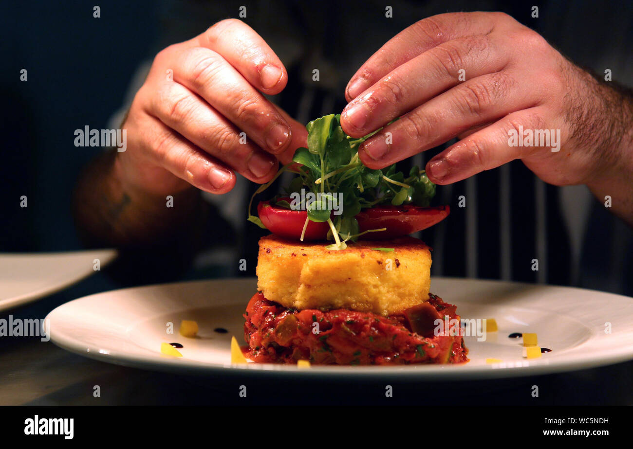 Garnishing Food High Resolution Stock Photography and Images - Alamy