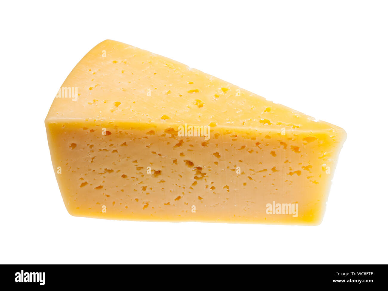 triangular segment of yellow cheese isolated on white background Stock ...