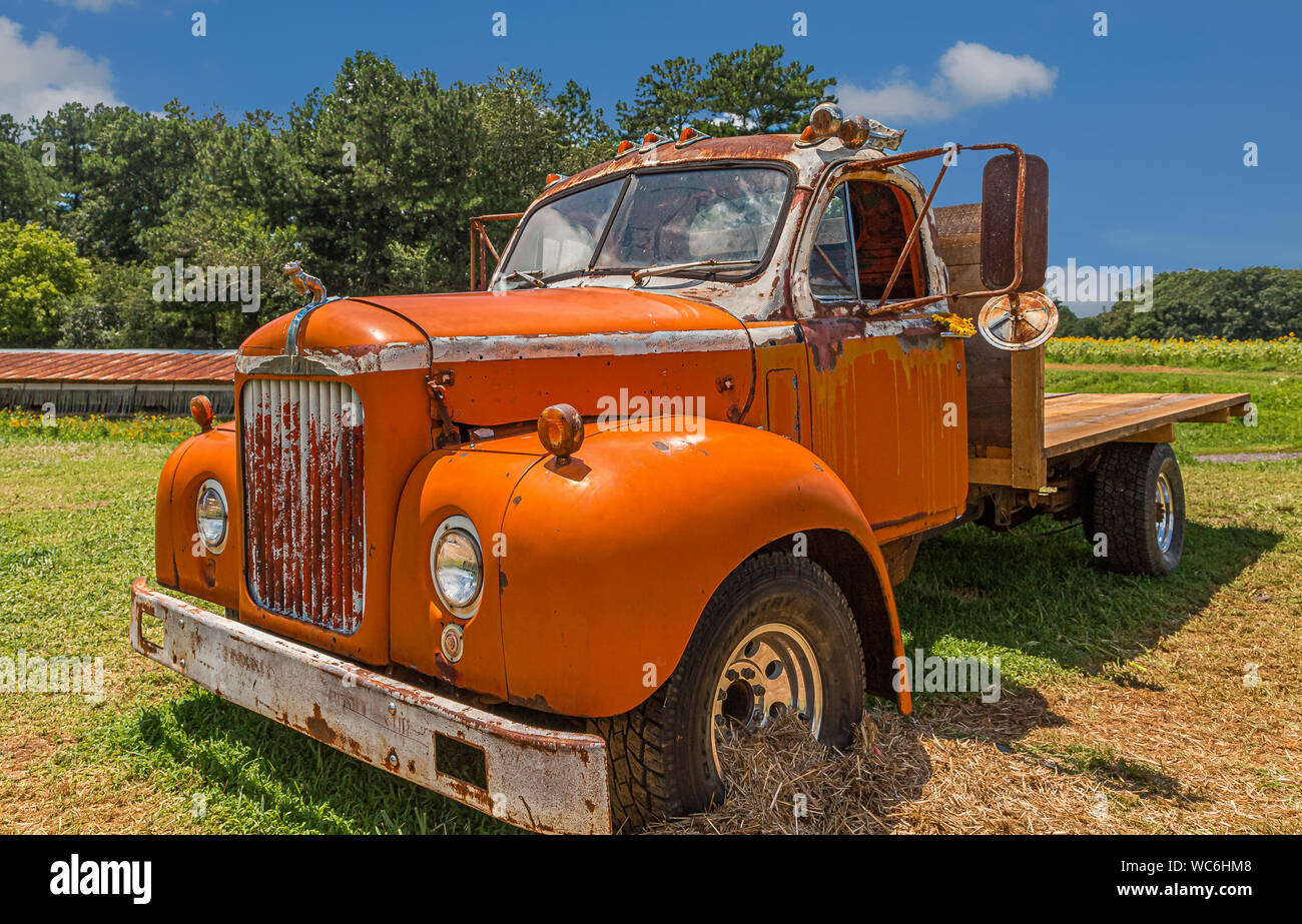 A rusty old truck on a farm Stock Photo - Alamy