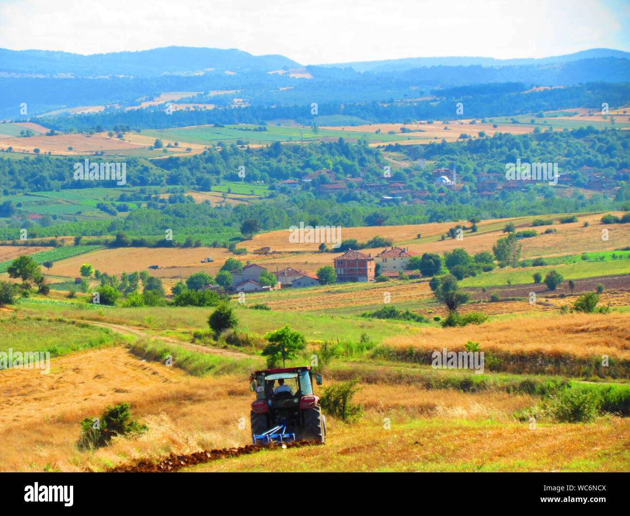 Person on tractor hi-res stock photography and images - Alamy