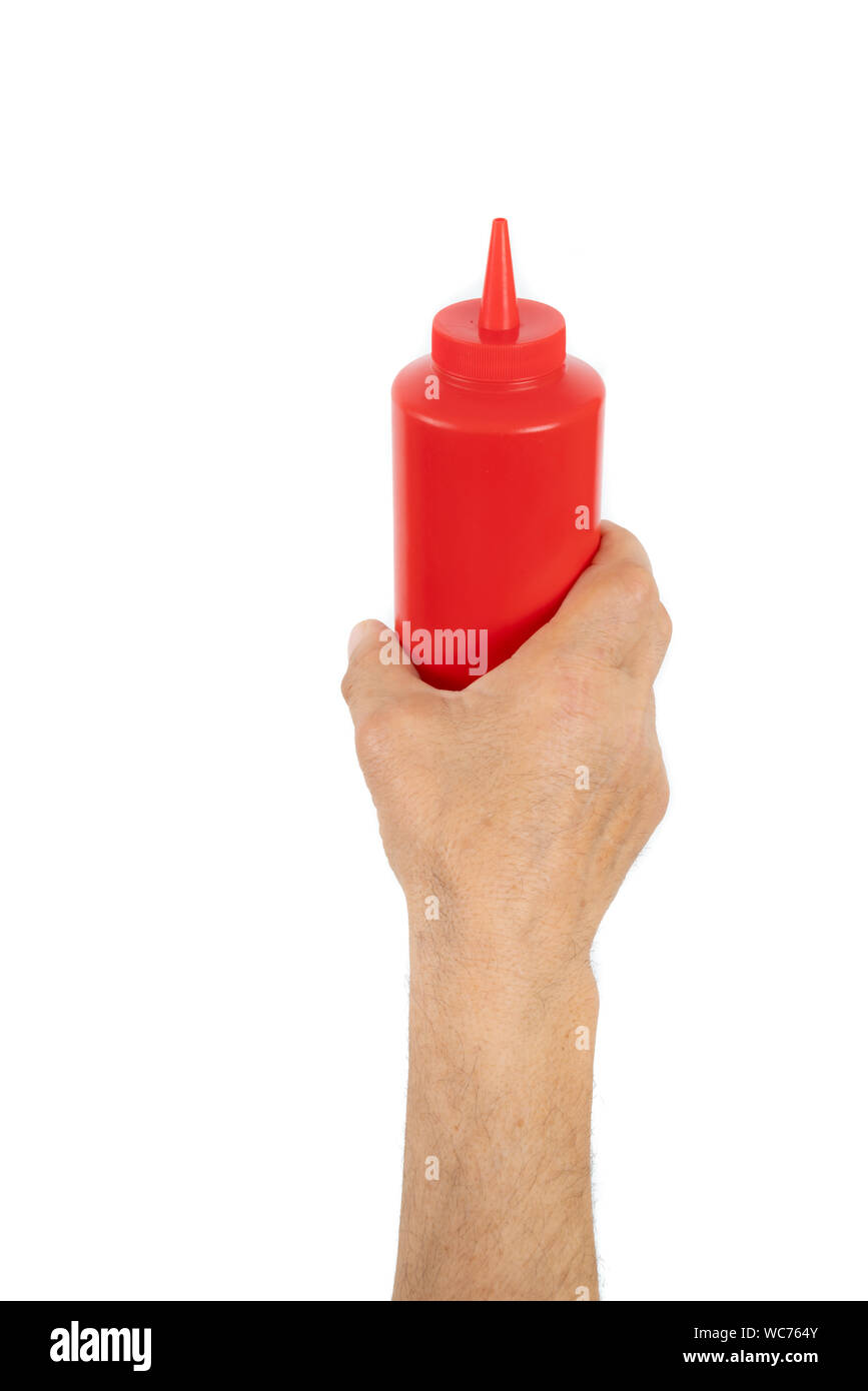 hand holding plastic ketchup box Stock Photo - Alamy