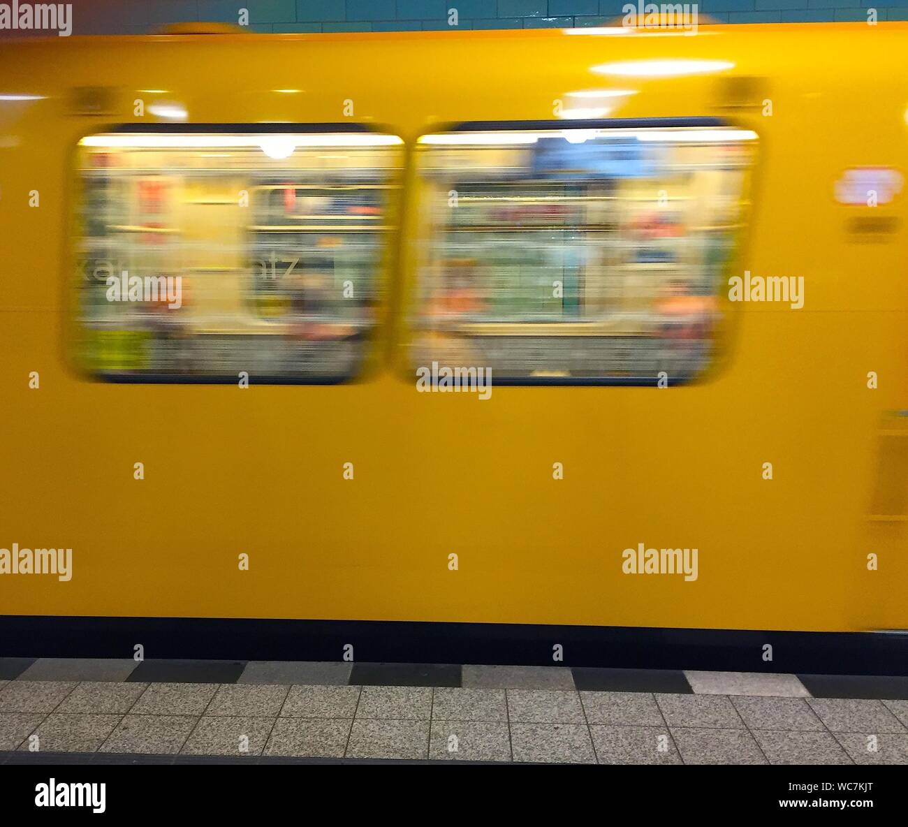 Blurred yellow train hi-res stock photography and images - Alamy