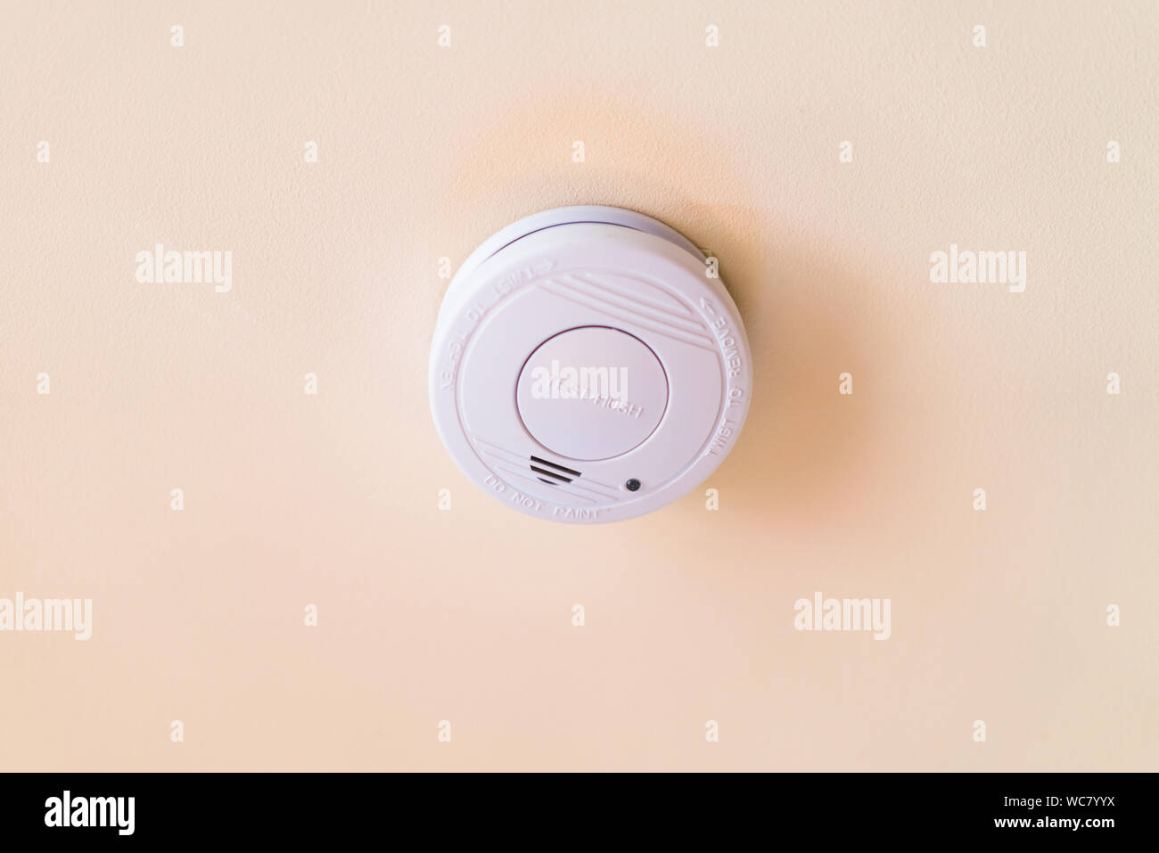 White smoke detector on a ceiling close up Stock Photo - Alamy