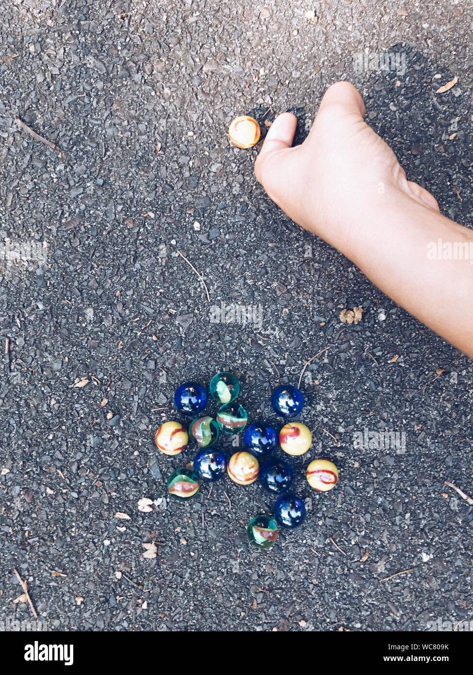 Boy marbles hi-res stock photography and images - Alamy