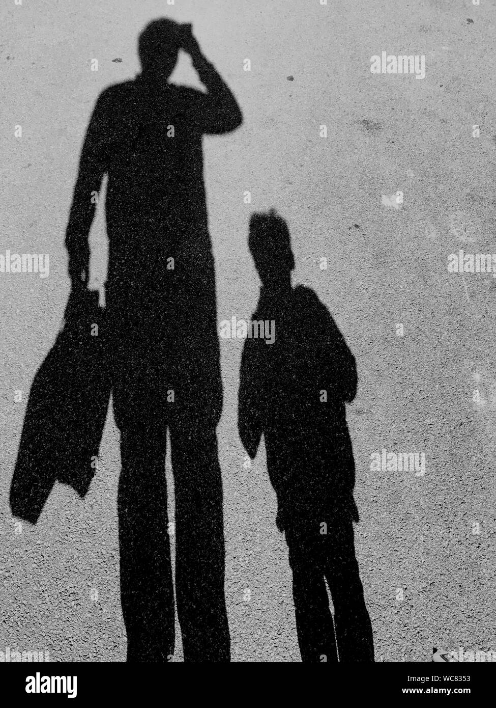 Father and son activity Black and White Stock Photos & Images - Alamy