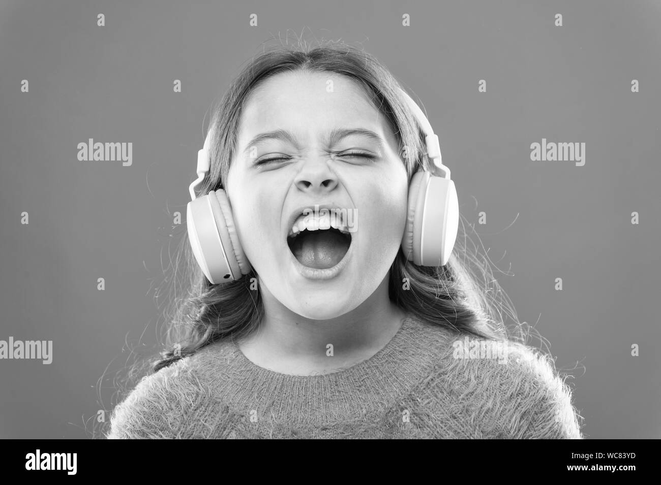 For better vocal performances. Adorable small child doing vocal on song ...