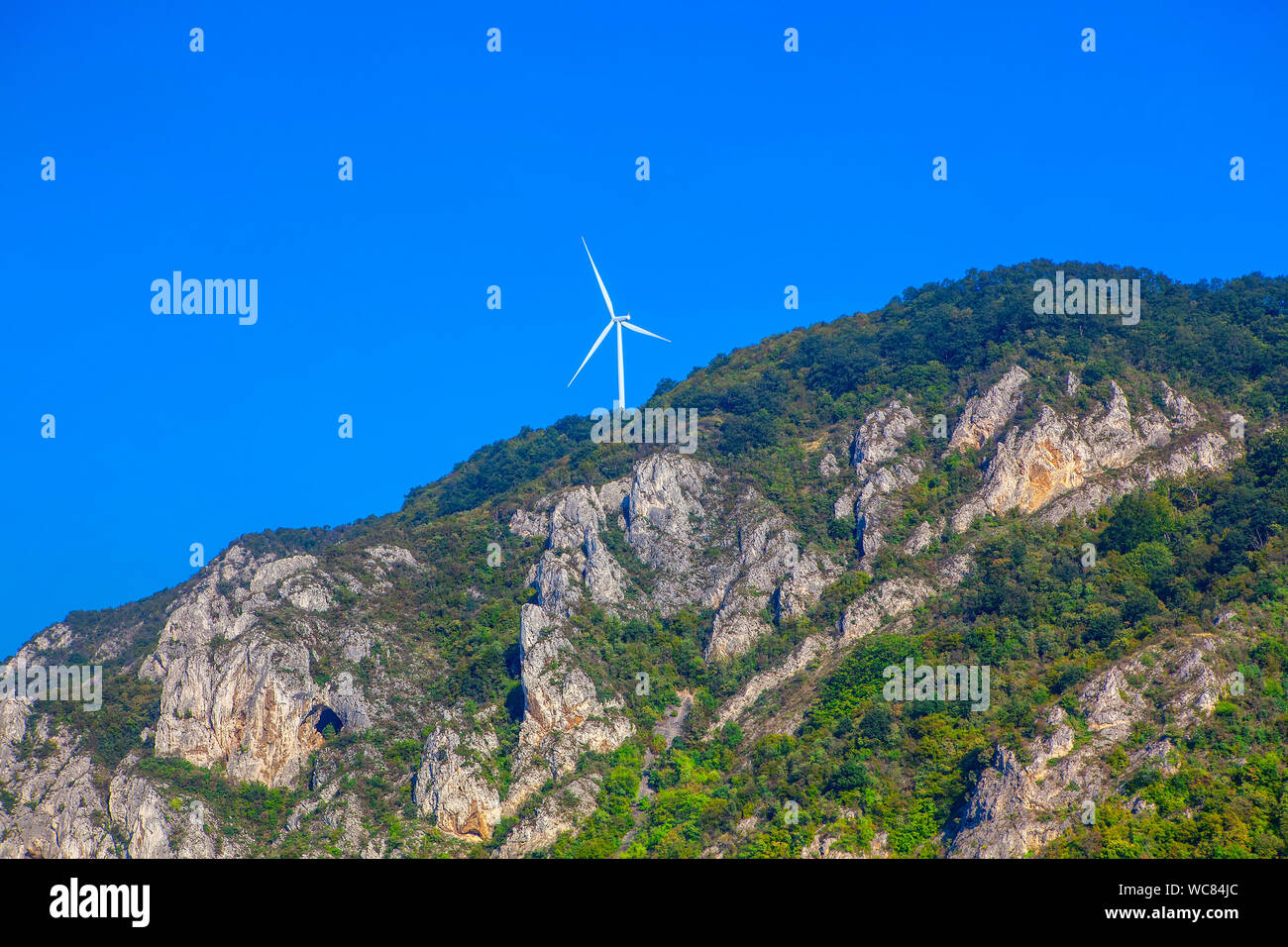 wind turbine installed on top of the mountain Stock Photo - Alamy