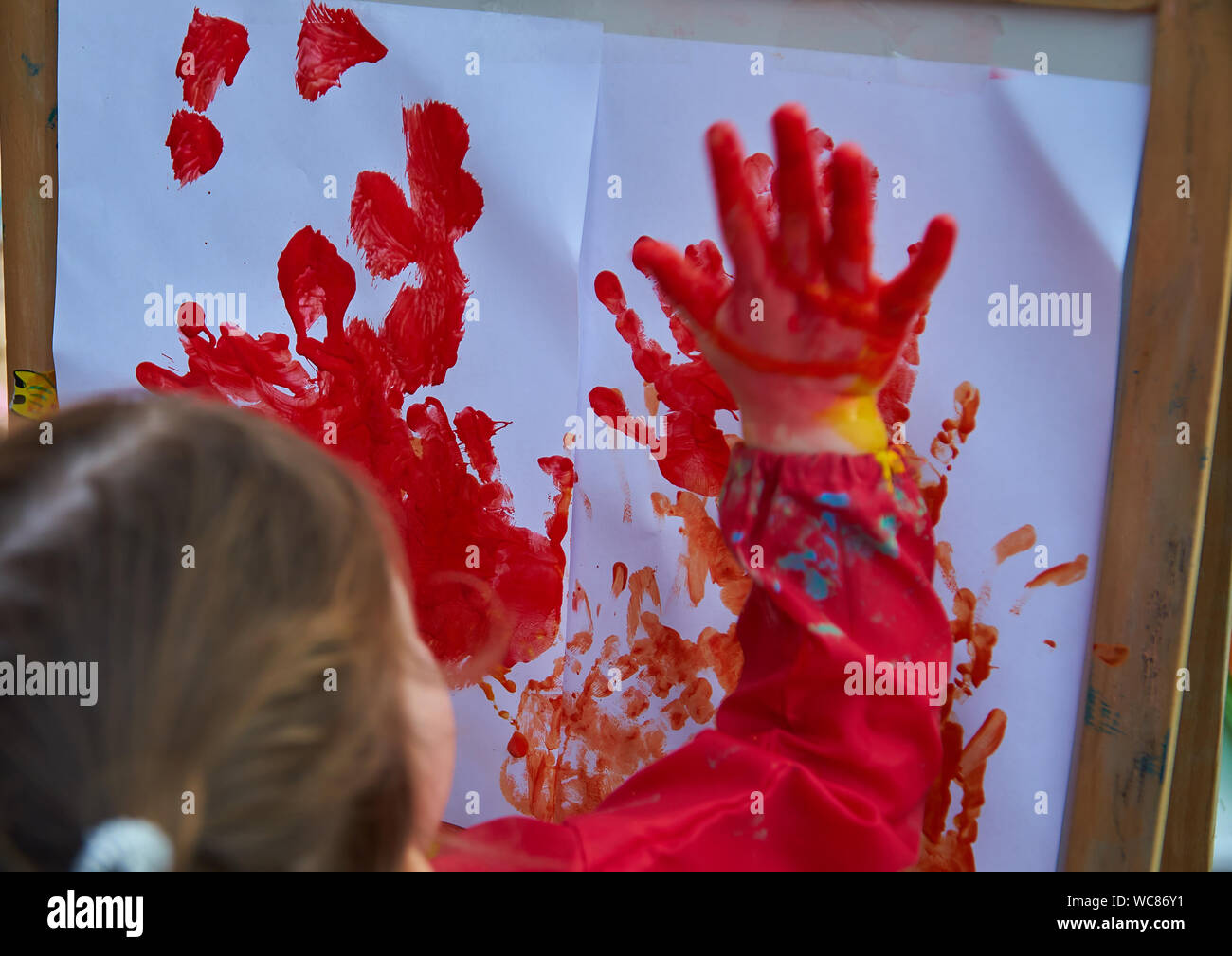 Red paint people hi-res stock photography and images - Alamy