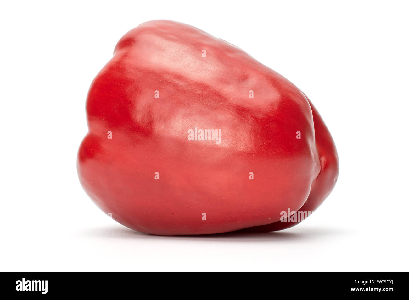 One whole red bell pepper isolated on white background Stock Photo - Alamy