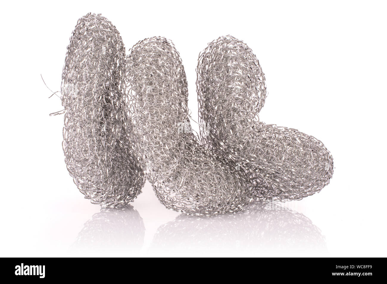 Group of three whole silver cleaning kitchen sponge isolated on white ...
