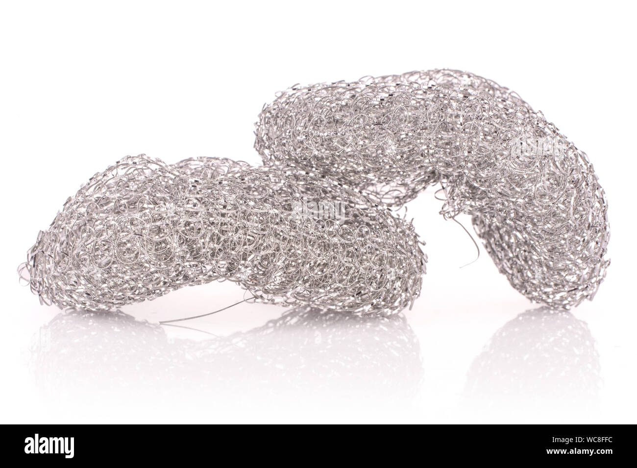 Group of two whole iron cleaning kitchen sponge isolated on white ...