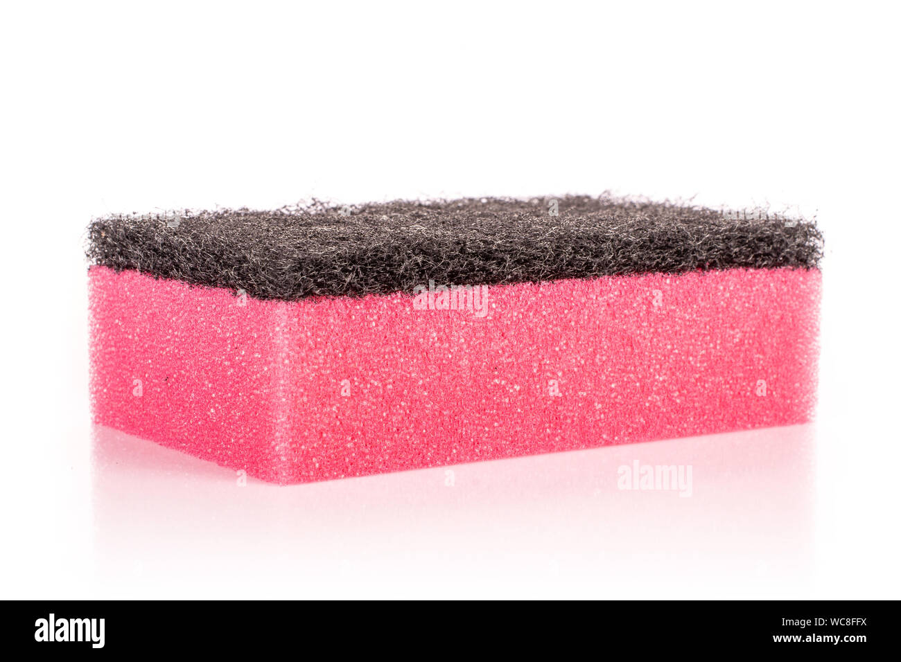 One whole pink cleaning kitchen sponge isolated on white background ...