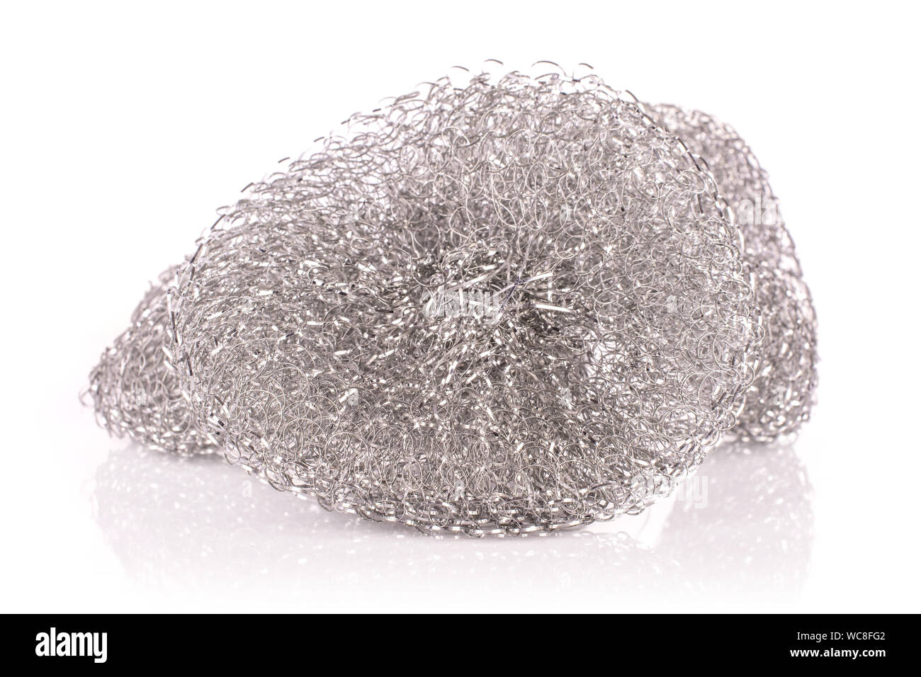 Group of three whole iron cleaning kitchen sponge isolated on white ...