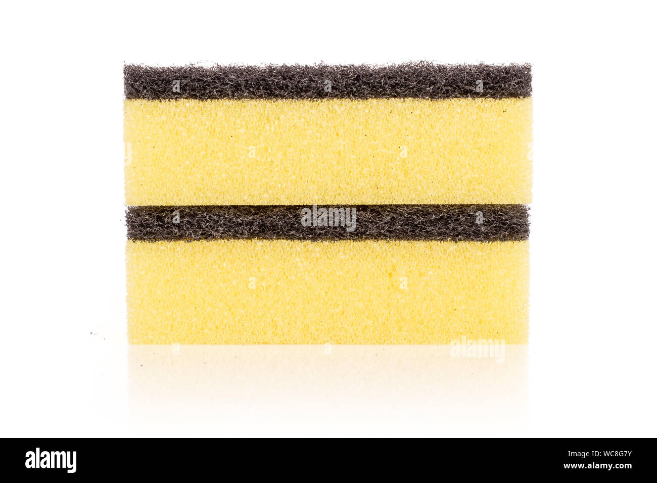 Group of two whole yellow cleaning kitchen sponge isolated on white ...