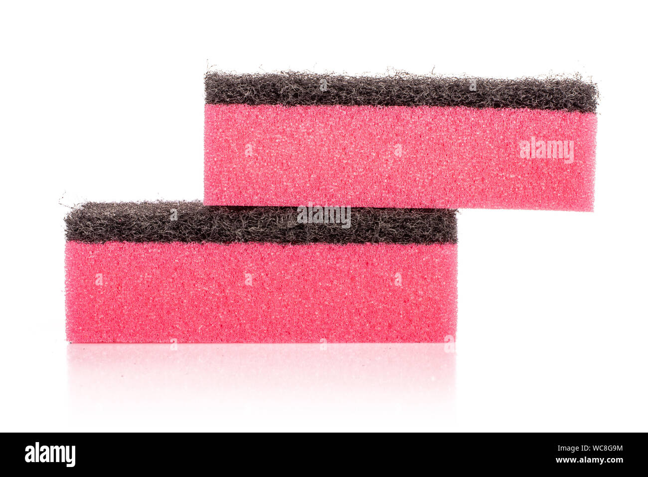 Group of two whole pink cleaning kitchen sponge isolated on white ...