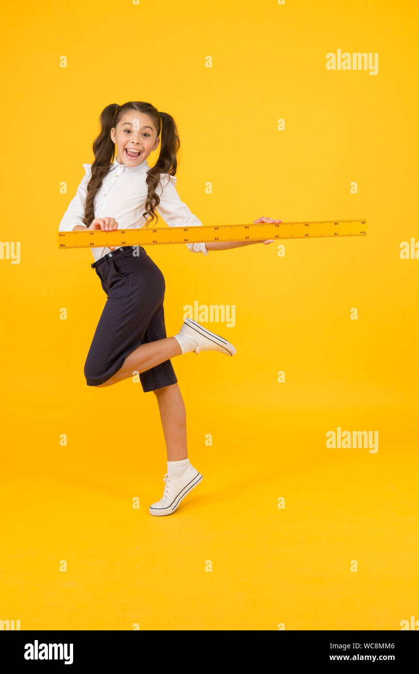 Girl using a ruler hi-res stock photography and images - Alamy