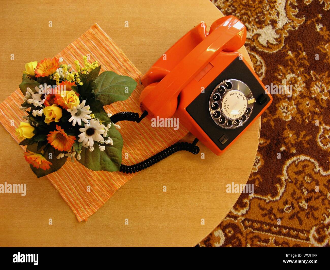 Orange telephone hi-res stock photography and images - Alamy