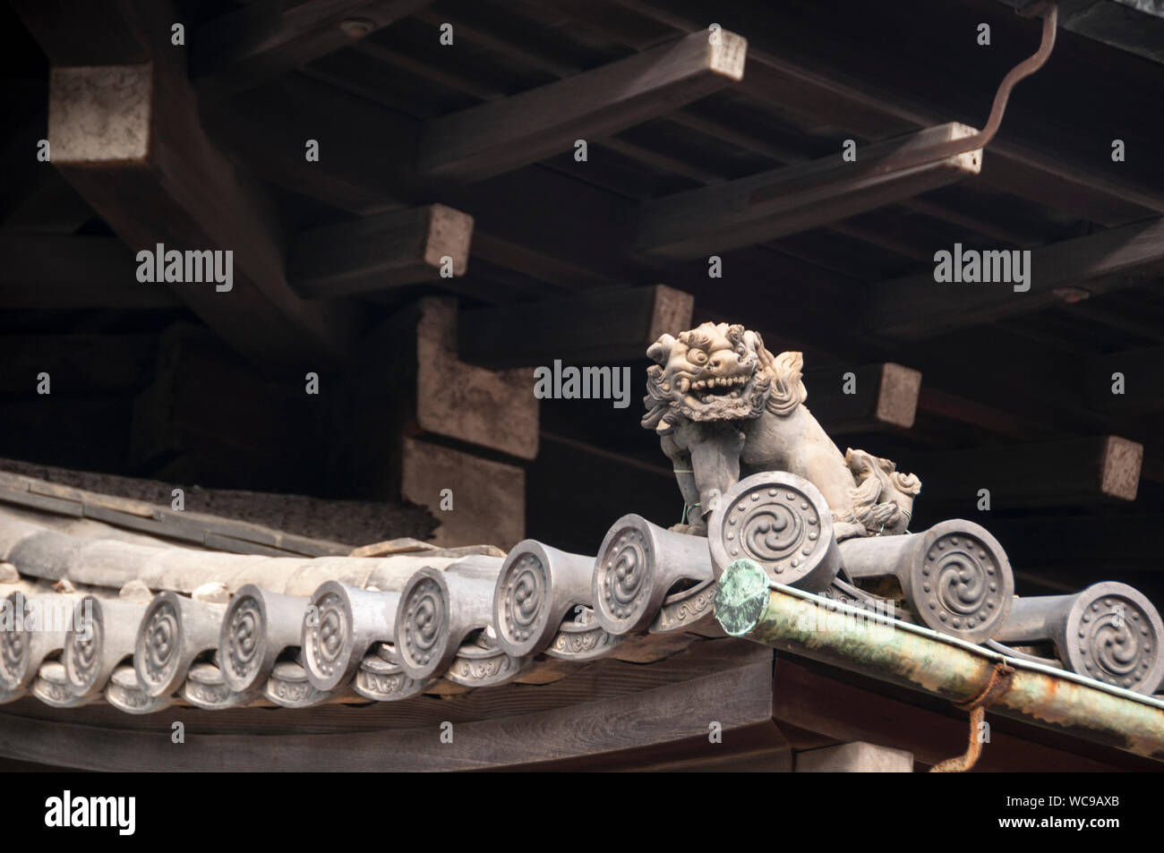 Roof with an oni, or Japanese demon, to protect the dwelling from evil ...