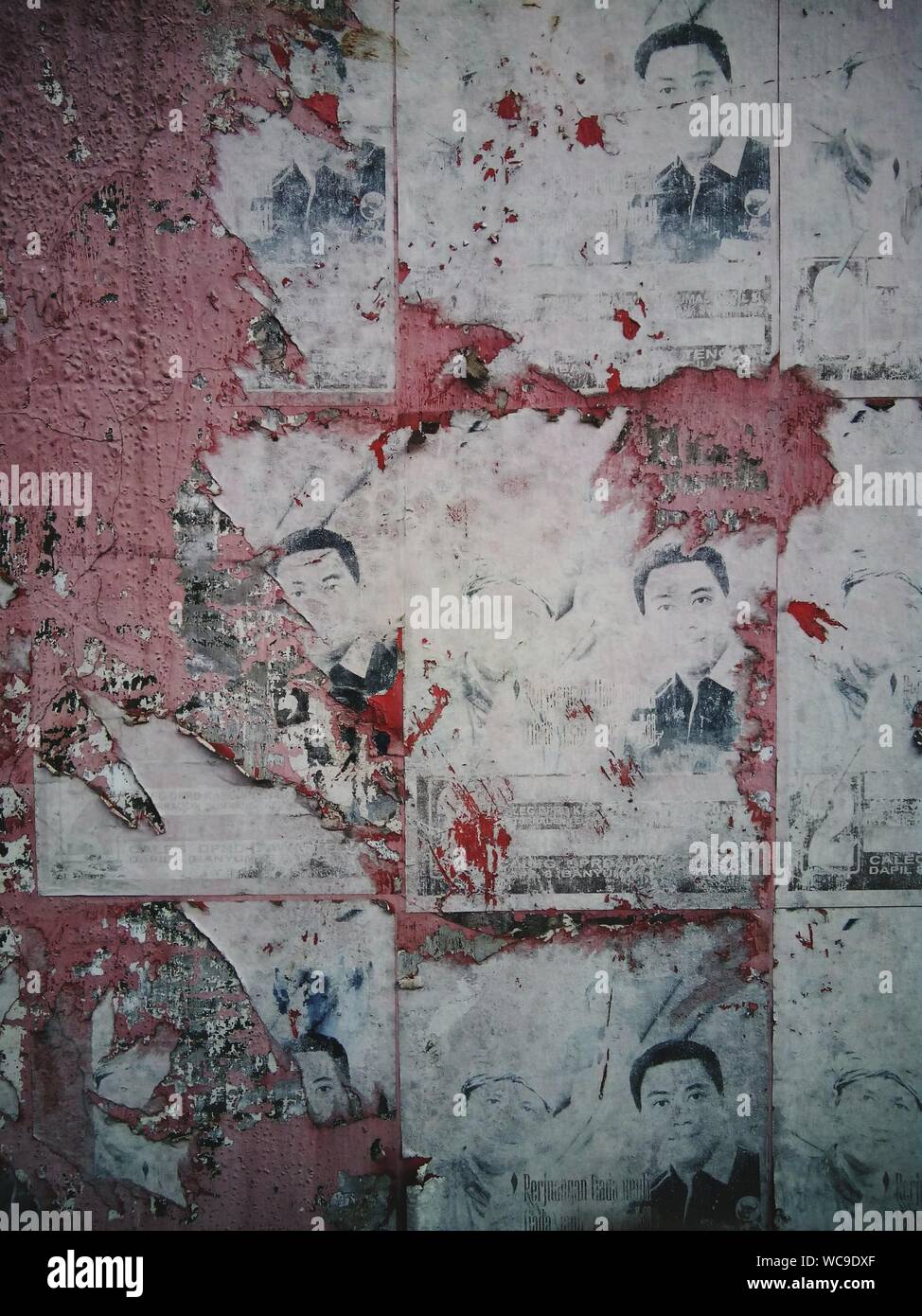 Torn posters on wall hi-res stock photography and images - Alamy