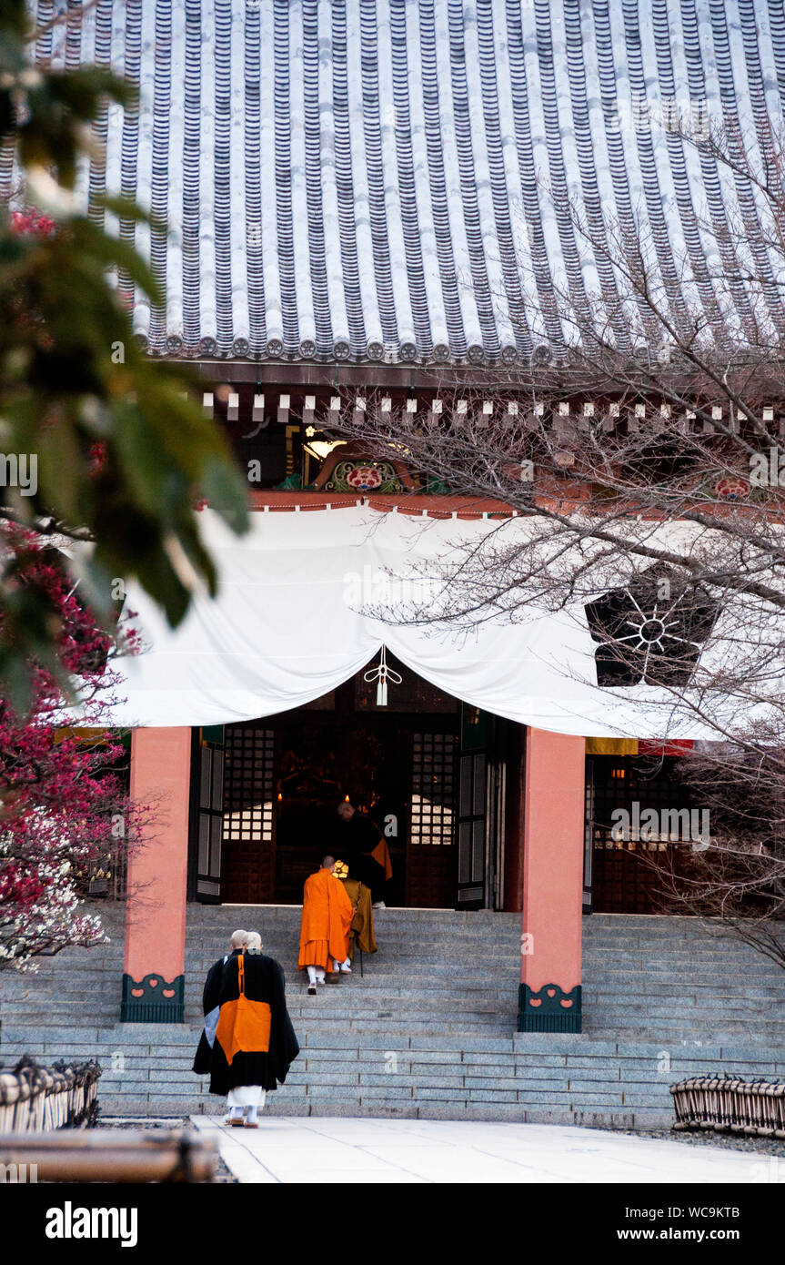 Monks in Kyoto climbing stairs, Japan Stock Photo - Alamy