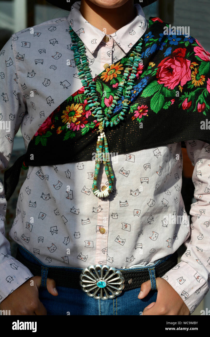 A young Navajo boy wearing traditional turquoise and silver Native ...