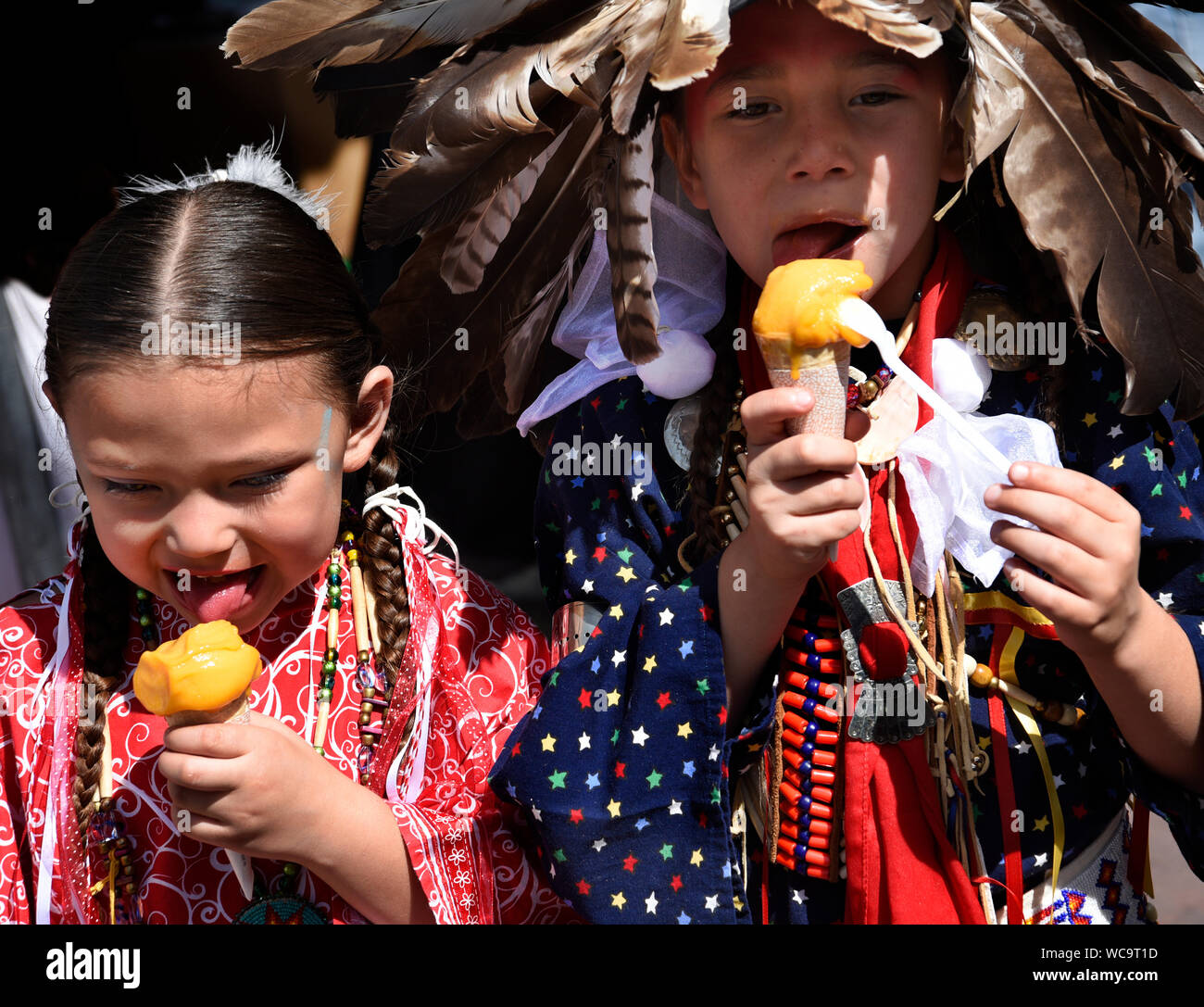 Two Native American children wear traditional Native attire at the ...