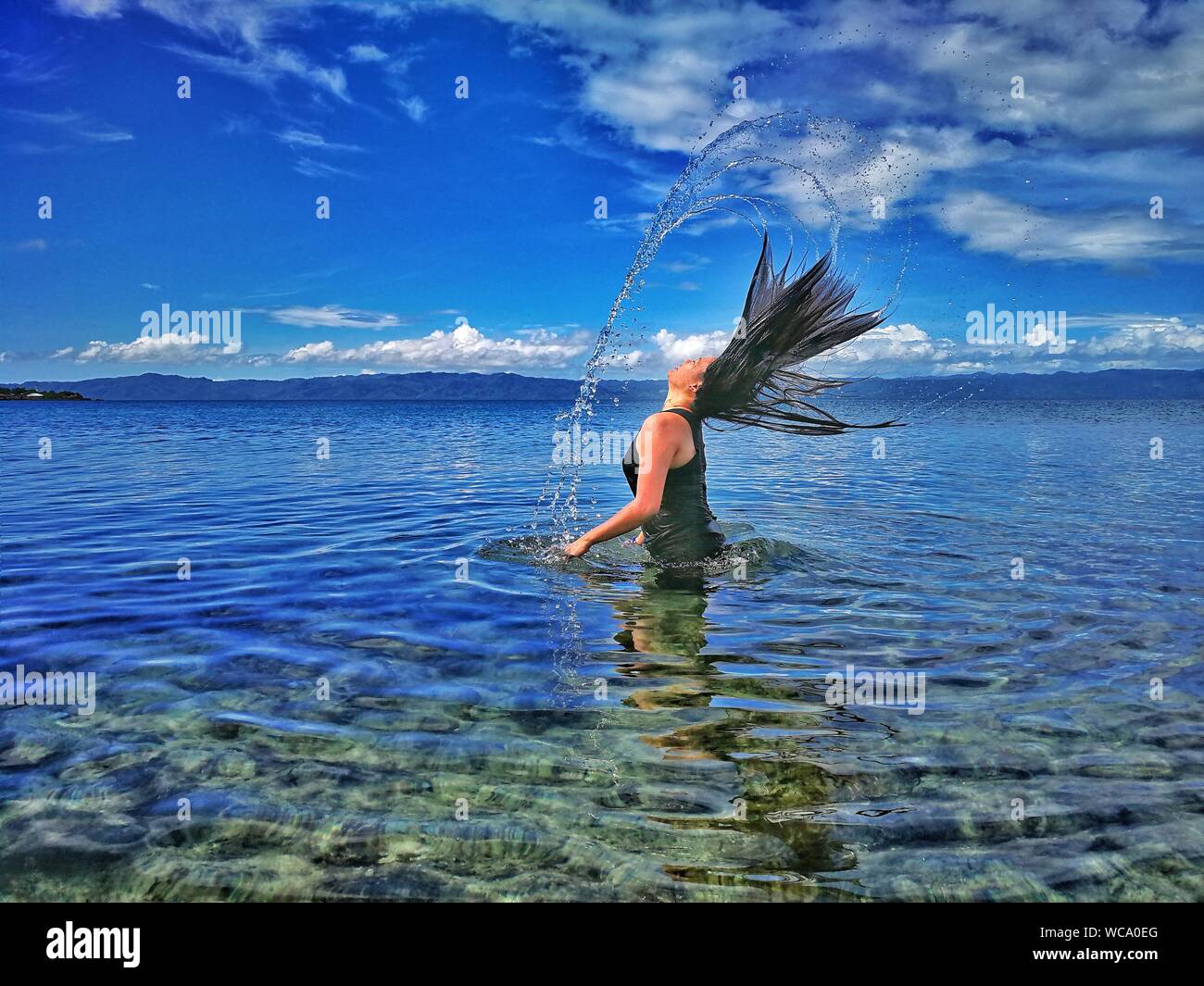 With long hair at sea hi-res stock photography and images - Alamy