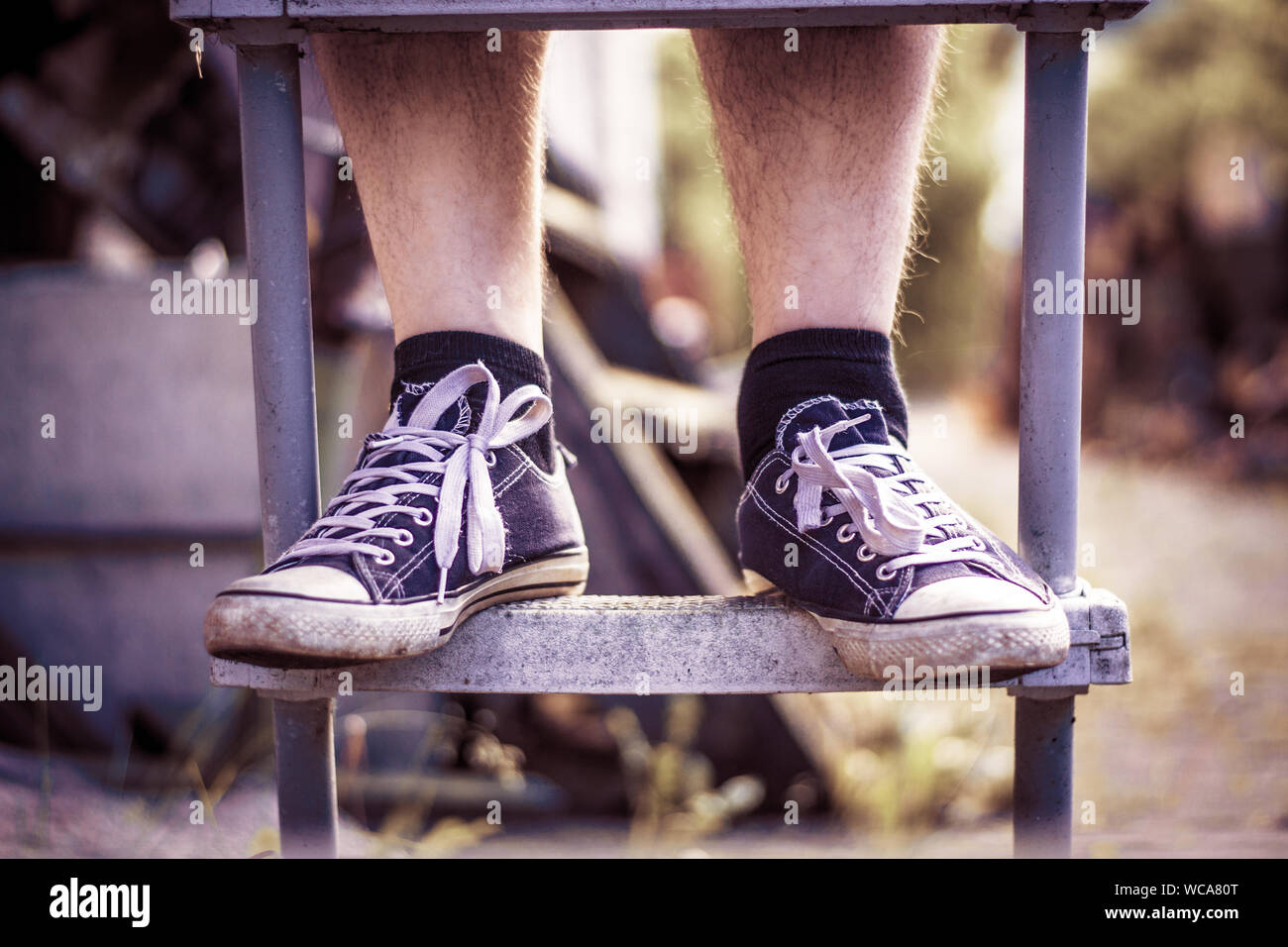 Standing on ladder hi-res stock photography and images - Alamy