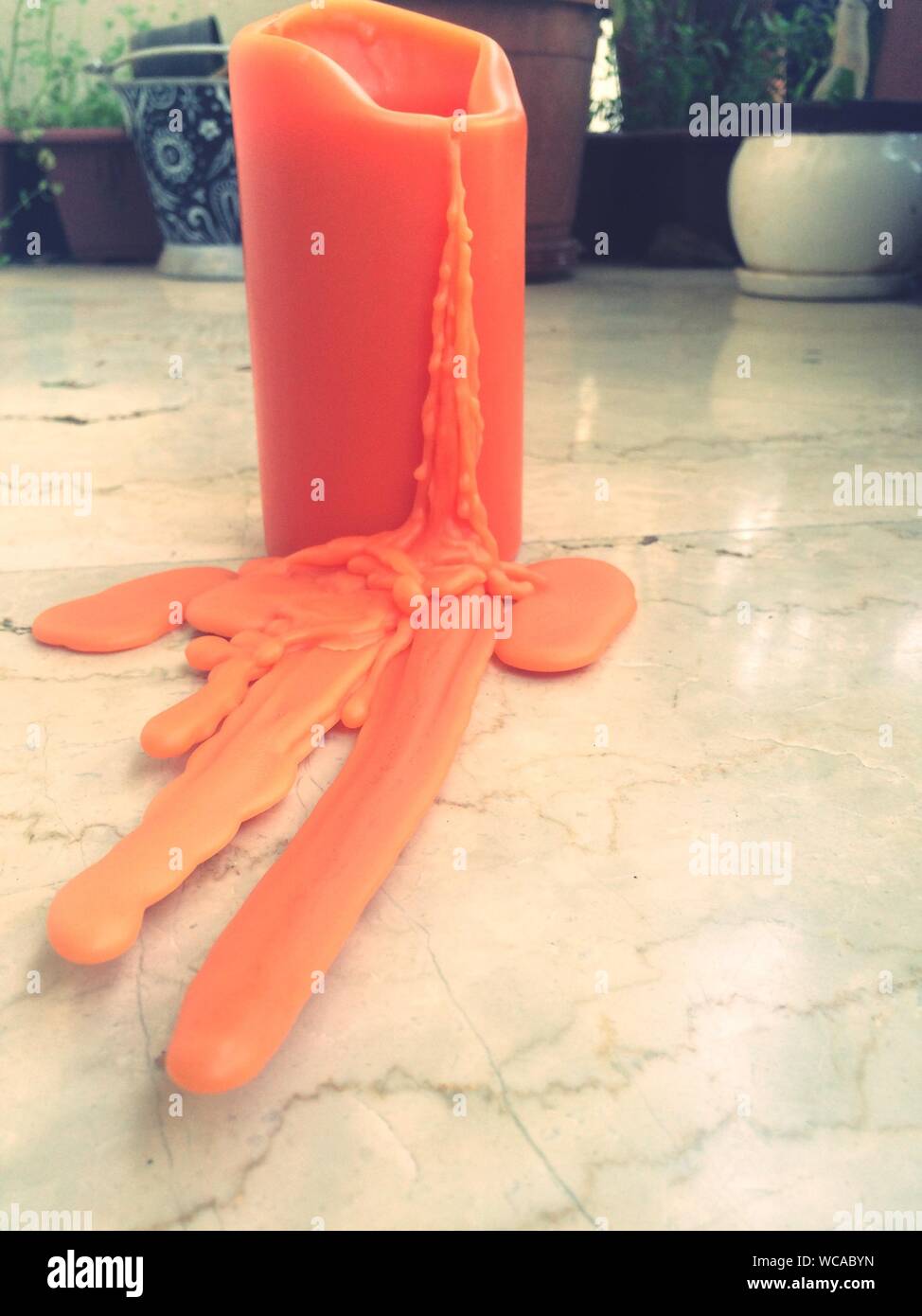 Melted wax candle hi-res stock photography and images - Alamy