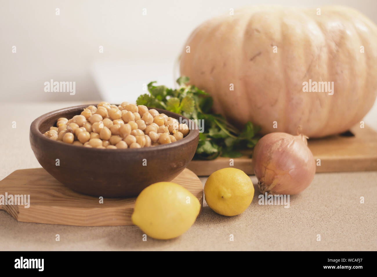 Cooked chickpeas in a bowl, group of vegetables Stock Photo - Alamy