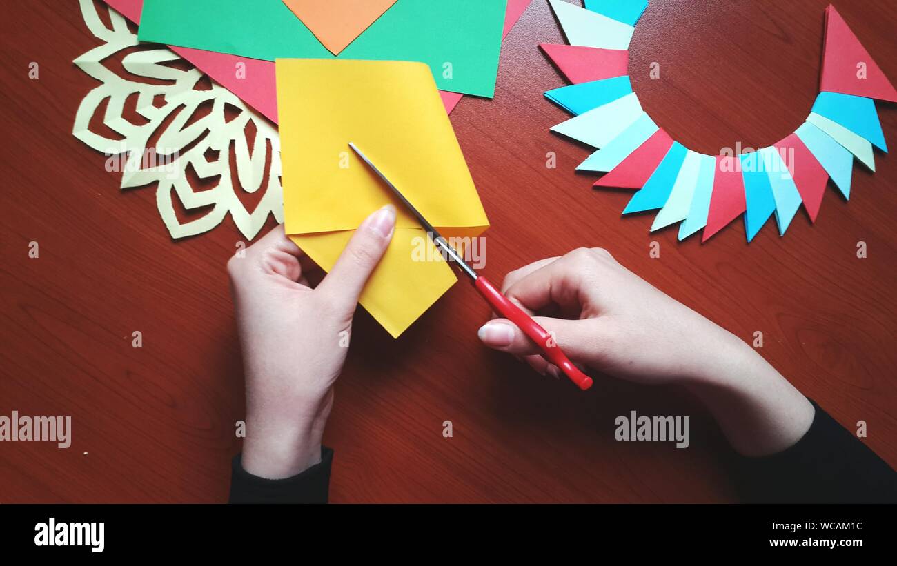 Cutting of paper hi-res stock photography and images - Alamy