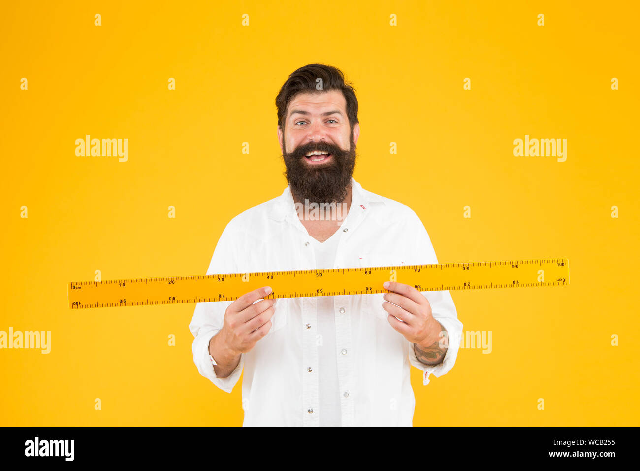 There is no substitute for a great teacher. Happy teacher holding ruler ...