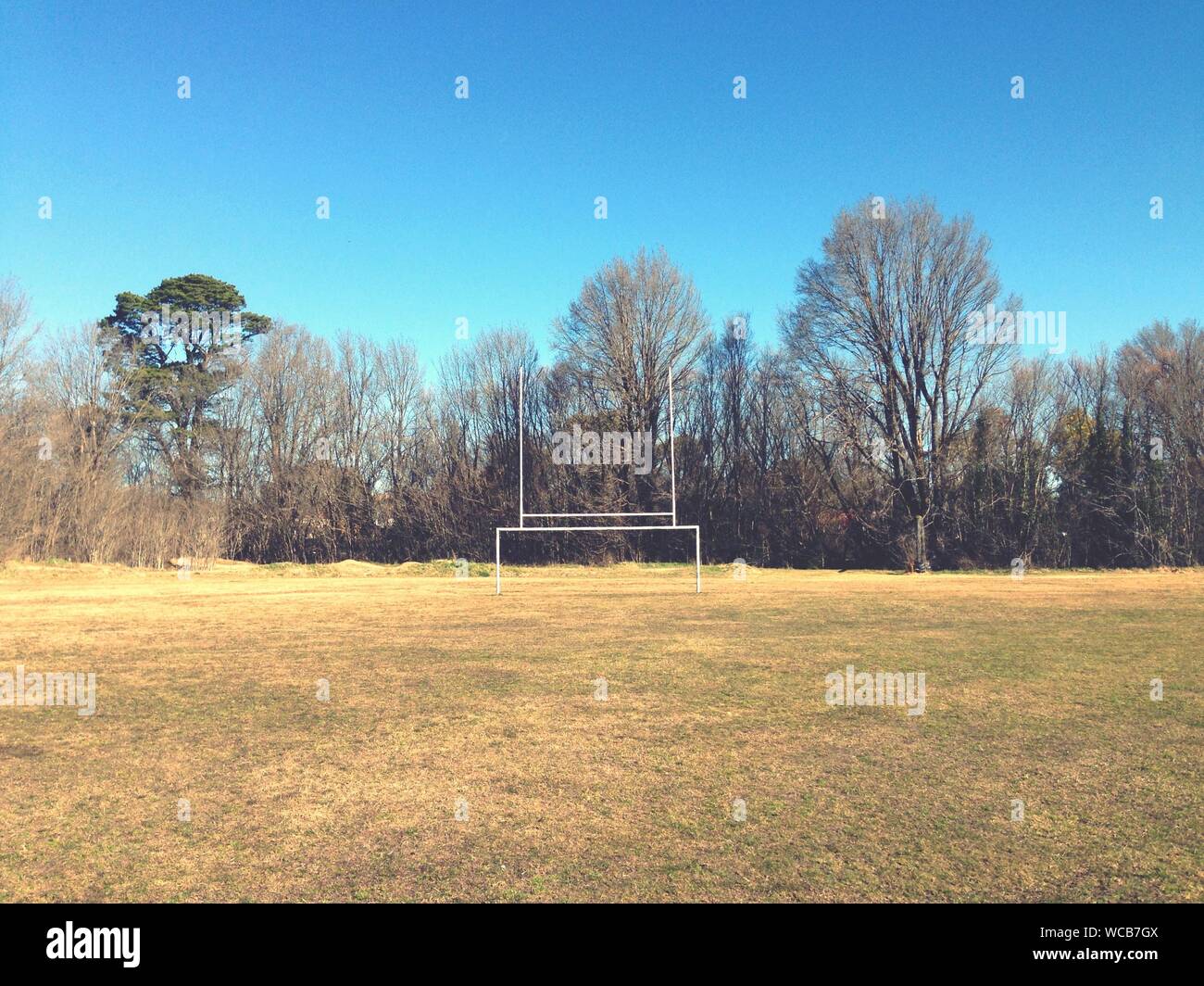 Football field blue sky hi-res stock photography and images - Alamy