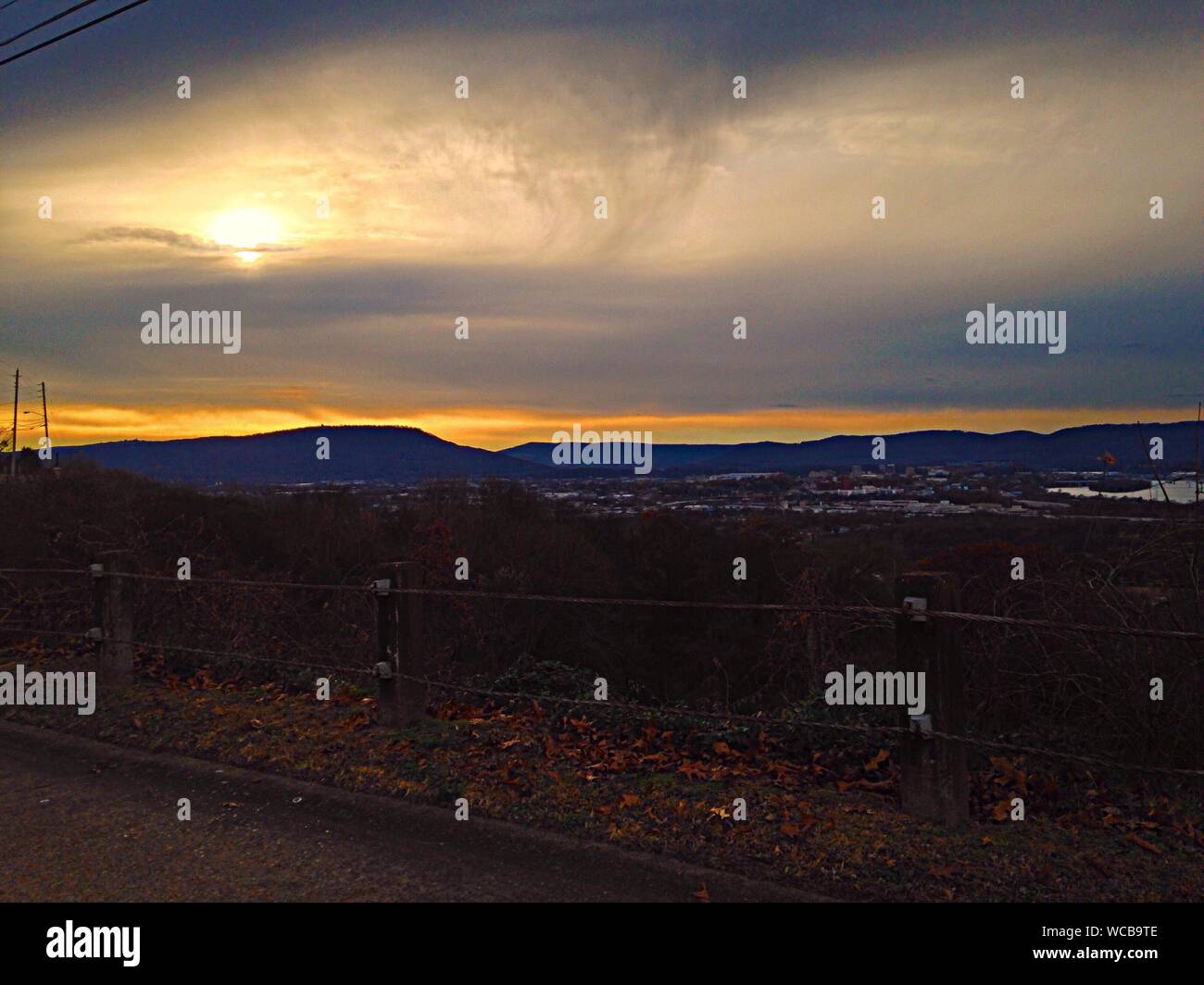Country Road At Sunset Stock Photo - Alamy