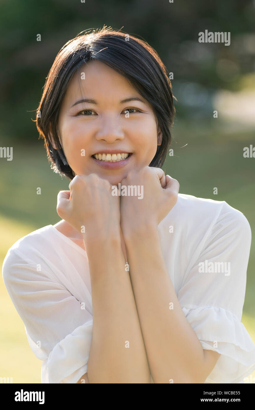 Woman with her head back looking at the camera hi-res stock photography ...