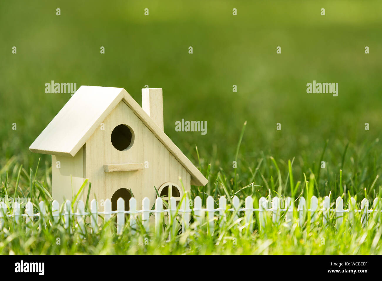 House on grass hi-res stock photography and images - Alamy