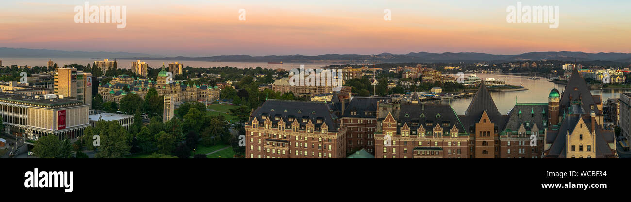 A panoramic view of downtown Victoria, BC, Canada taken at sunrise ...