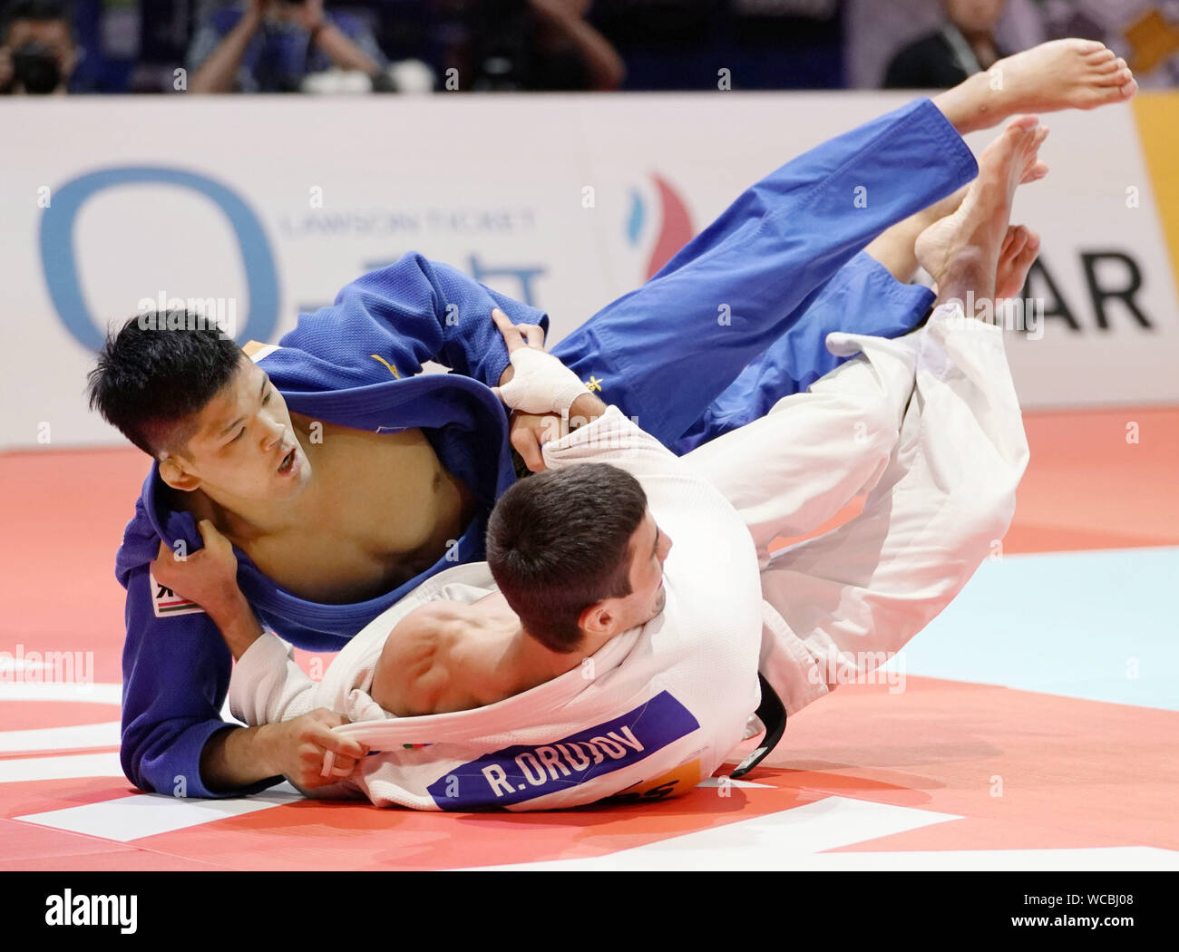 Tokyo, Japan. 27th Aug, 2019. Japan's Shohei Ono (blue) defeats Azerbaijan's Rustam Orujov in ...