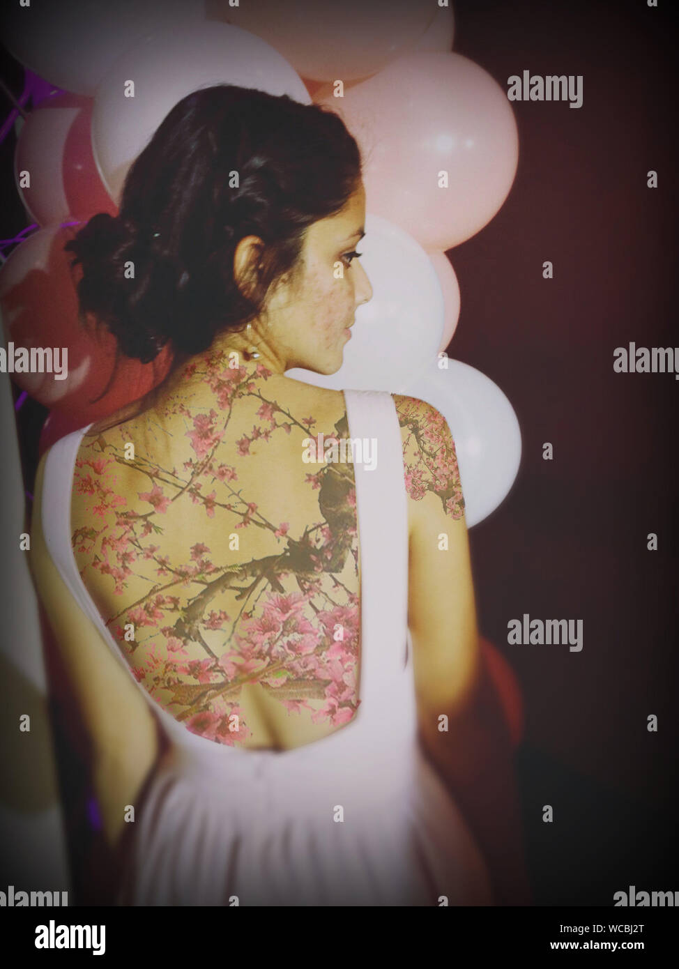 Woman tattooed back hi-res stock photography and images - Alamy