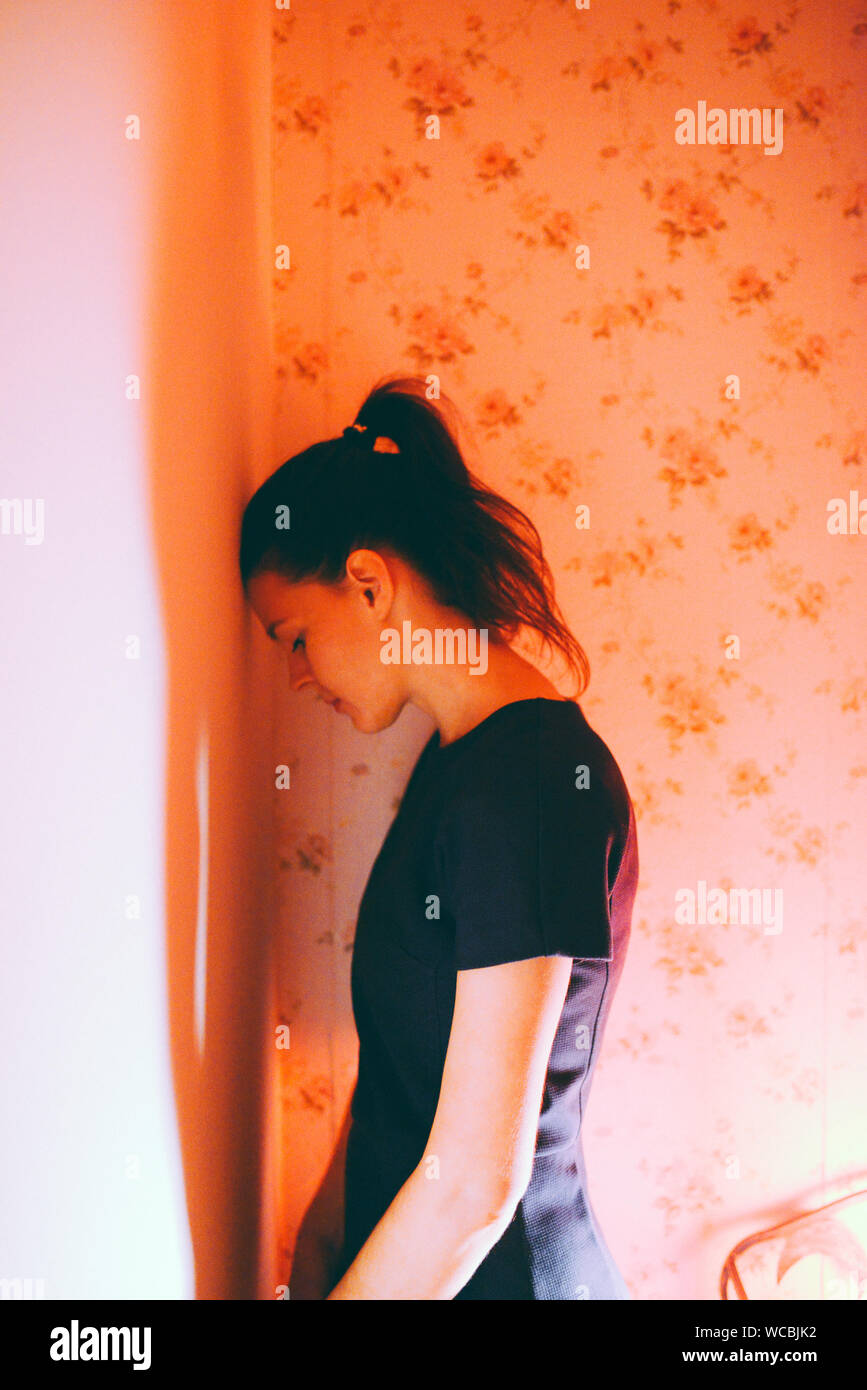 Standing in corner hi-res stock photography and images - Alamy