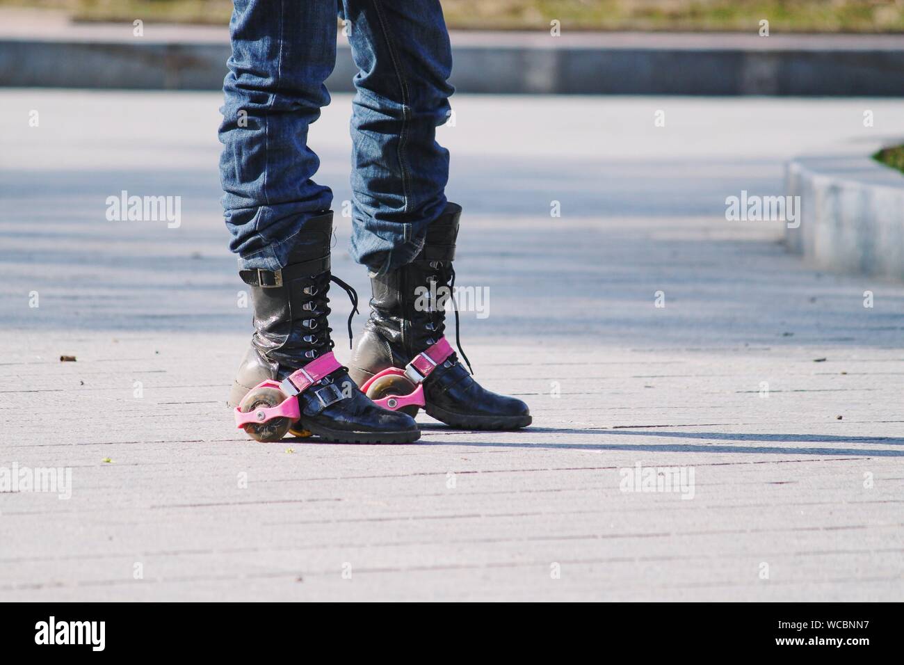 People wearing roller skates hi-res stock photography and images - Alamy
