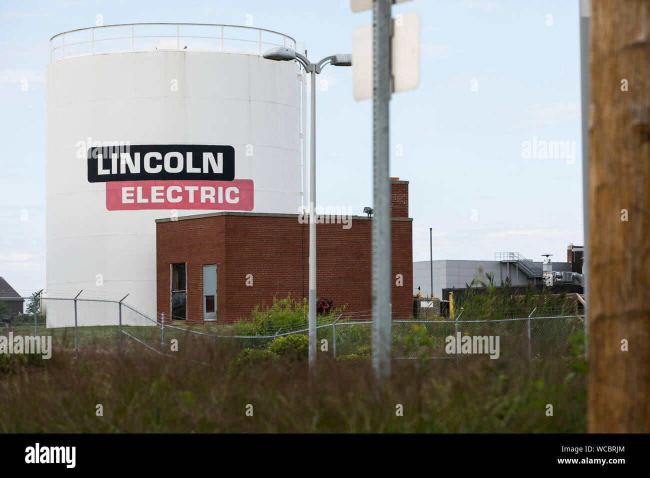 A logo sign outside of the headquarters of Lincoln Electric in Euclid ...