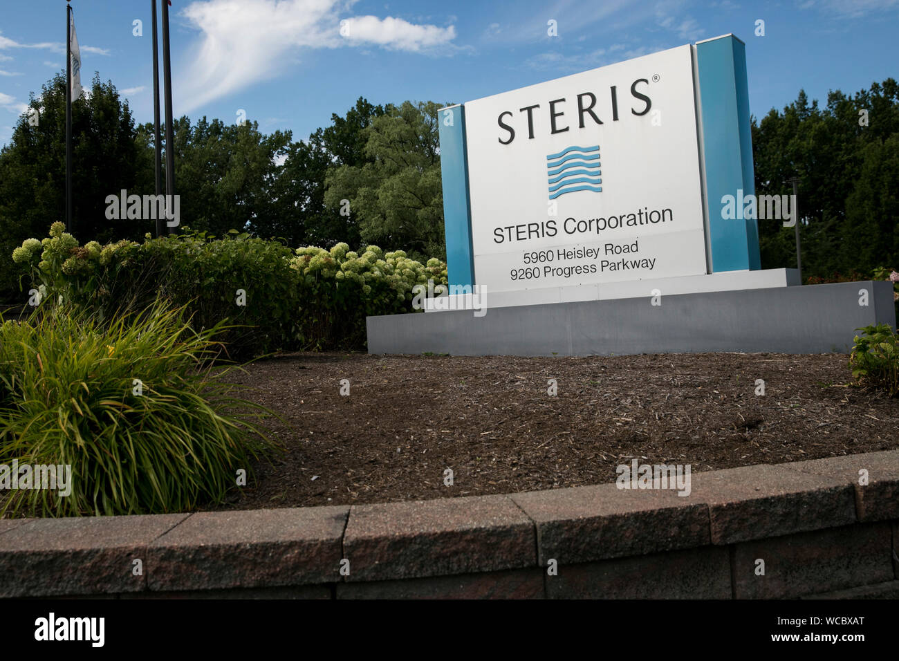 A logo sign outside of a facility occupied by the Steris Corporation in ...