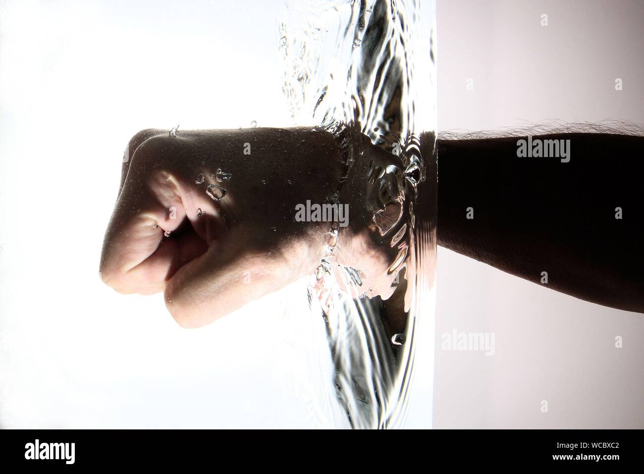 Fist punch water hi-res stock photography and images - Alamy