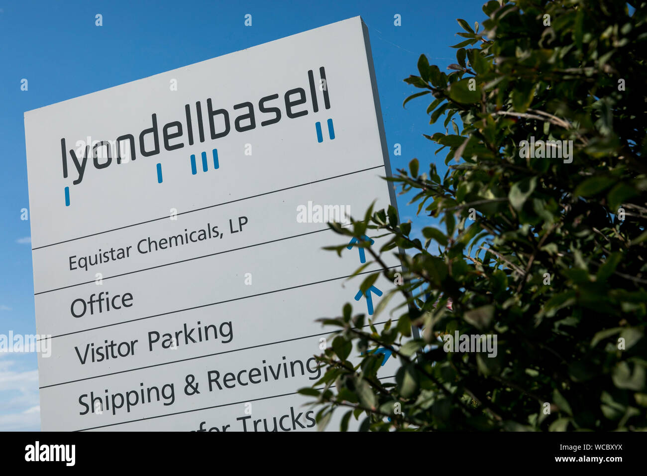A logo sign outside of a facility occupied by LyondellBasell Industries ...