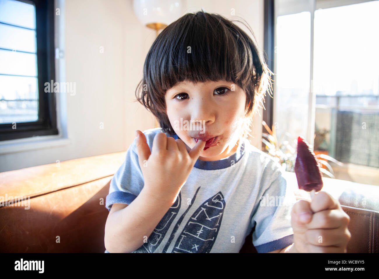 Boy with messy long hair hi-res stock photography and images - Alamy