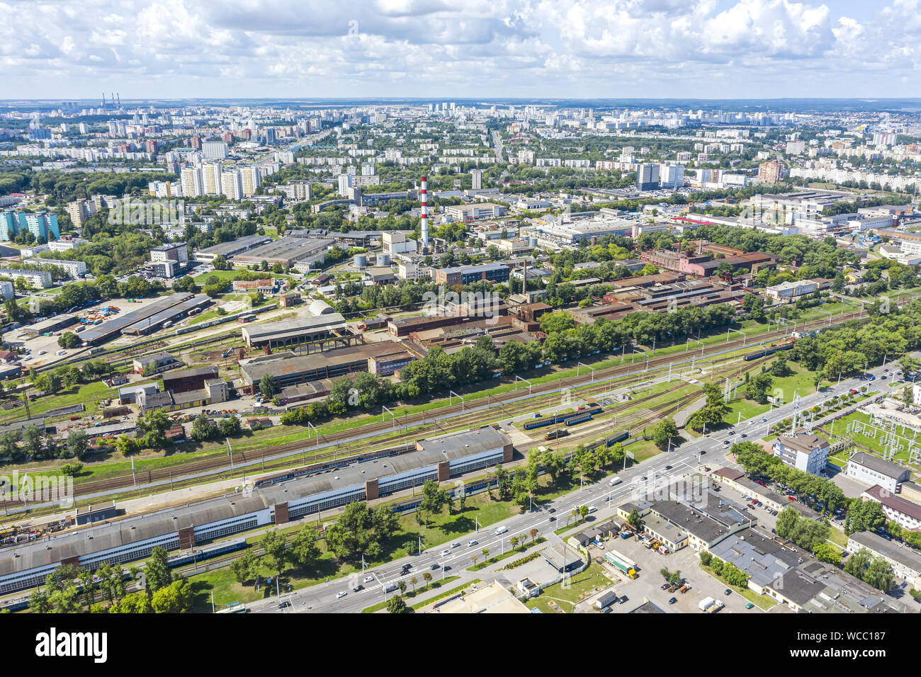 aerial panoramic image of city industrial zone. top view of roofs of ...
