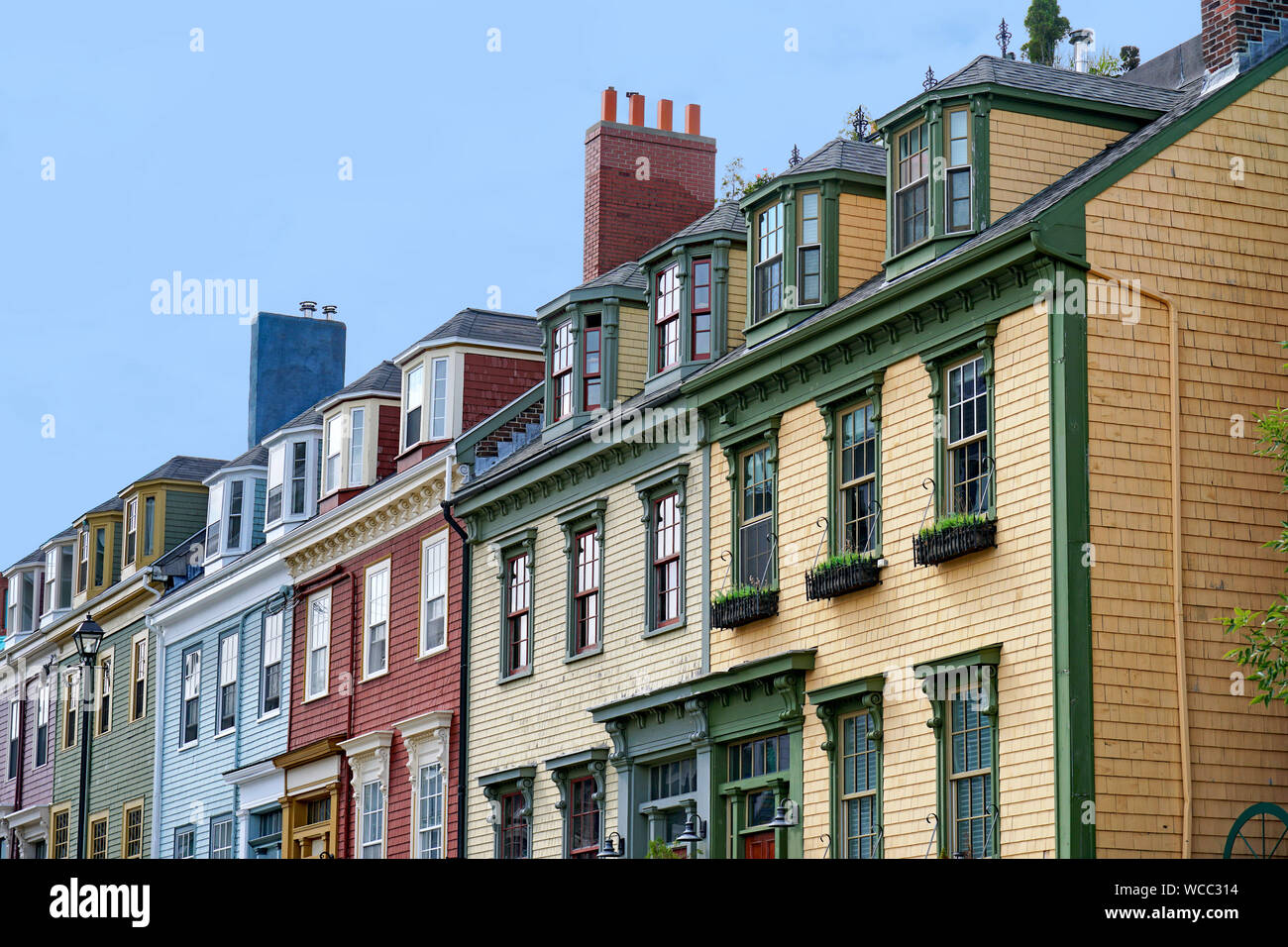 Row of colorful Victorian clapboard houses Stock Photo - Alamy