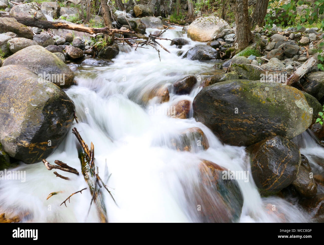 Beautiful mountain river with slow shutter Stock Photo - Alamy
