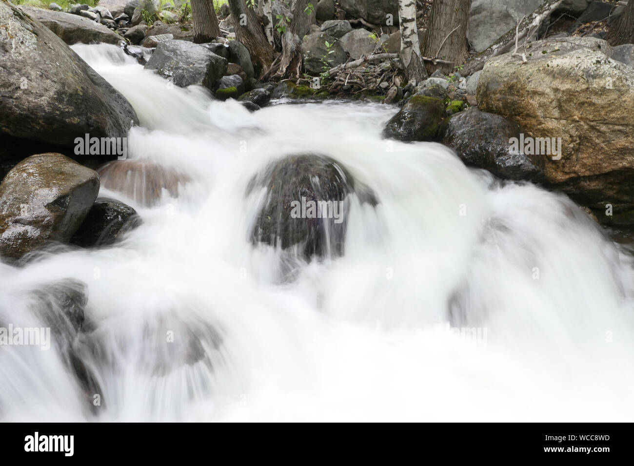 Beautiful mountain river with slow shutter Stock Photo - Alamy